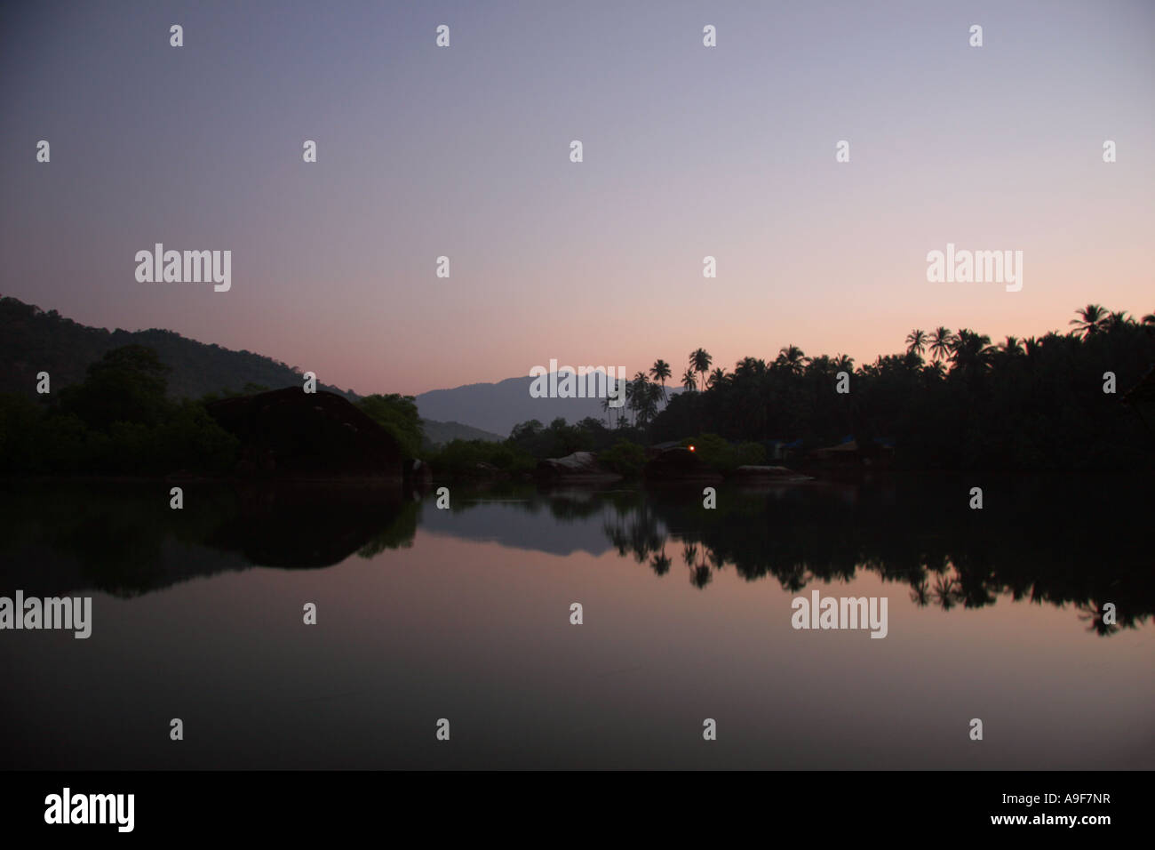 Looking across the estuary at sunrise in Palolem, Southern Goa, India ...