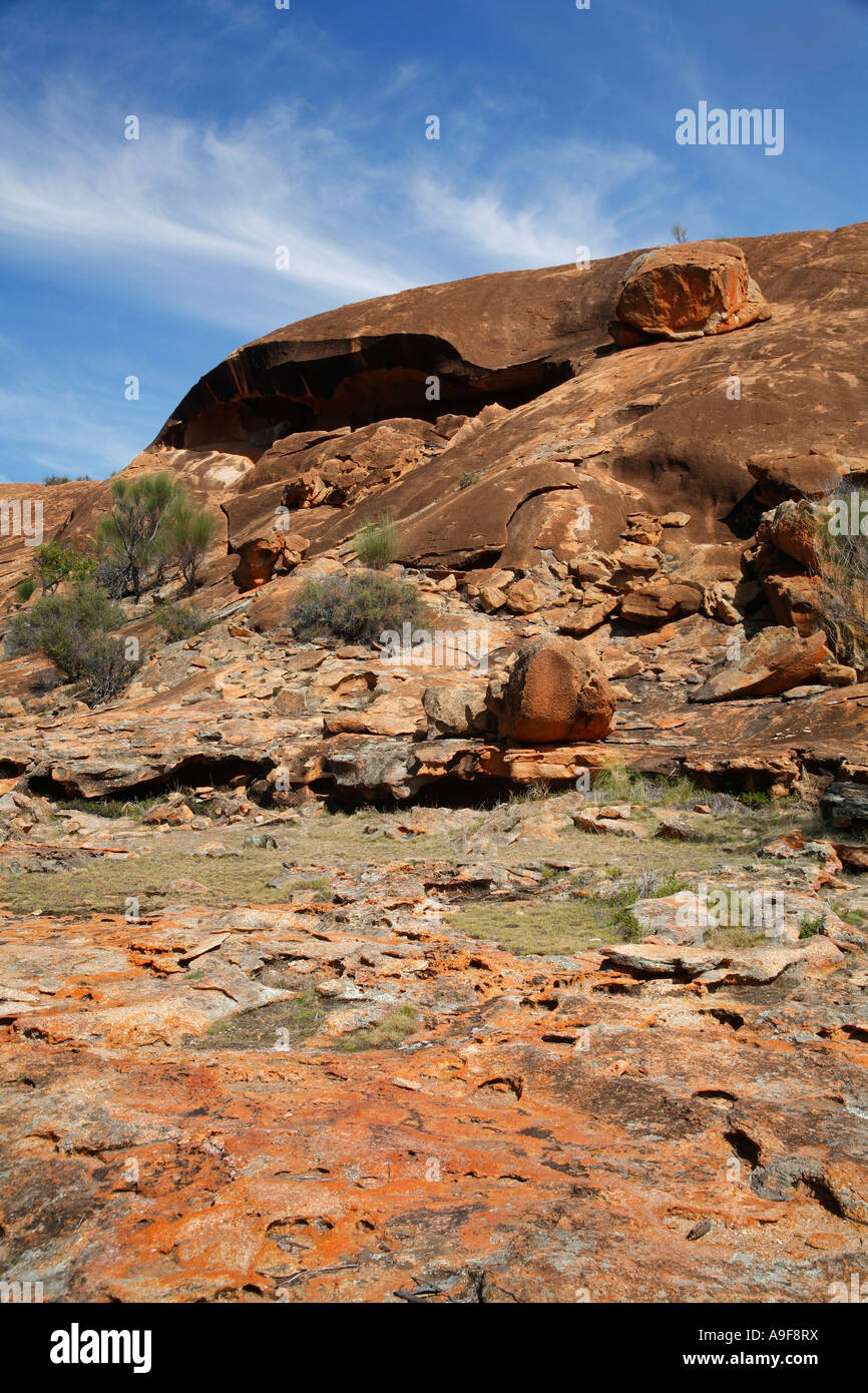 boulder and rock strewn granite outcrop formation in the arid Western ...