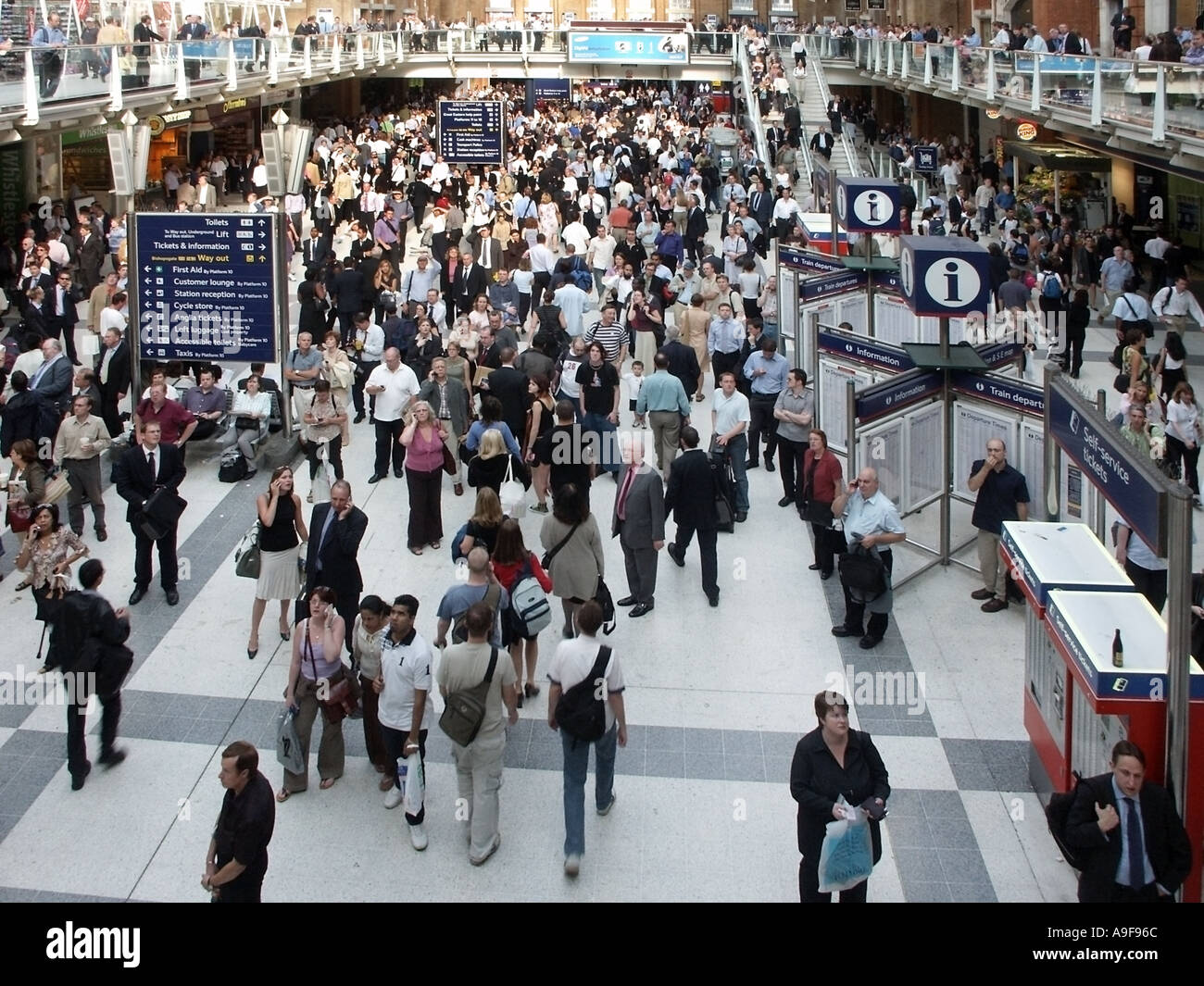 Liverpool Street station London UK crowd of people including office ...