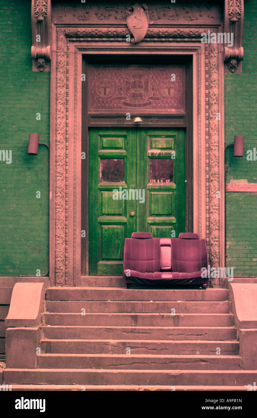 two automobile chair seats on steps of fraternity house University of ...