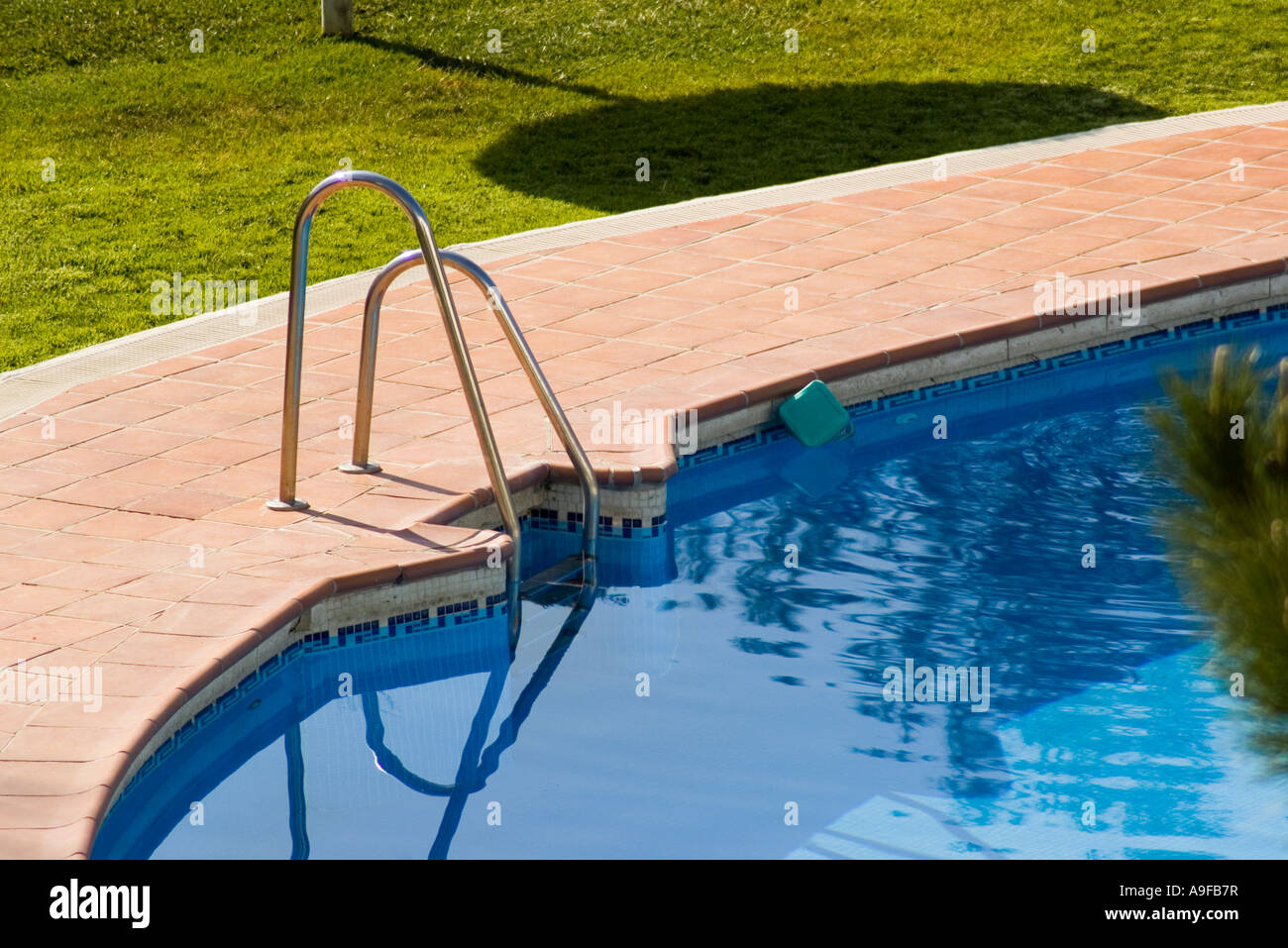 Swimming pool steps Stock Photo - Alamy