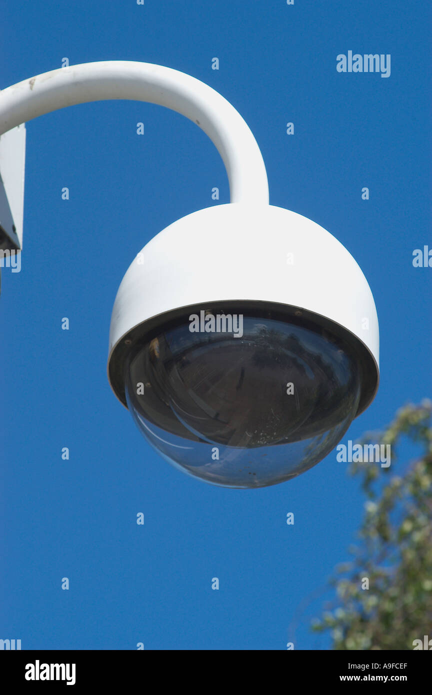 Revolving CCTV Security Camera in Housing Stock Photo - Alamy