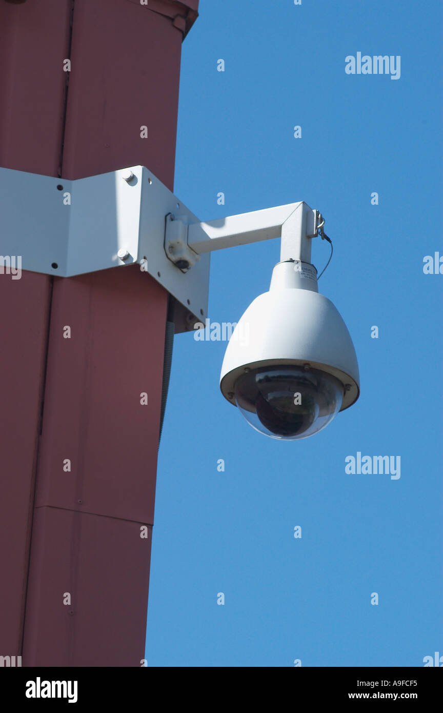 Revolving CCTV Security Camera in Housing Stock Photo - Alamy
