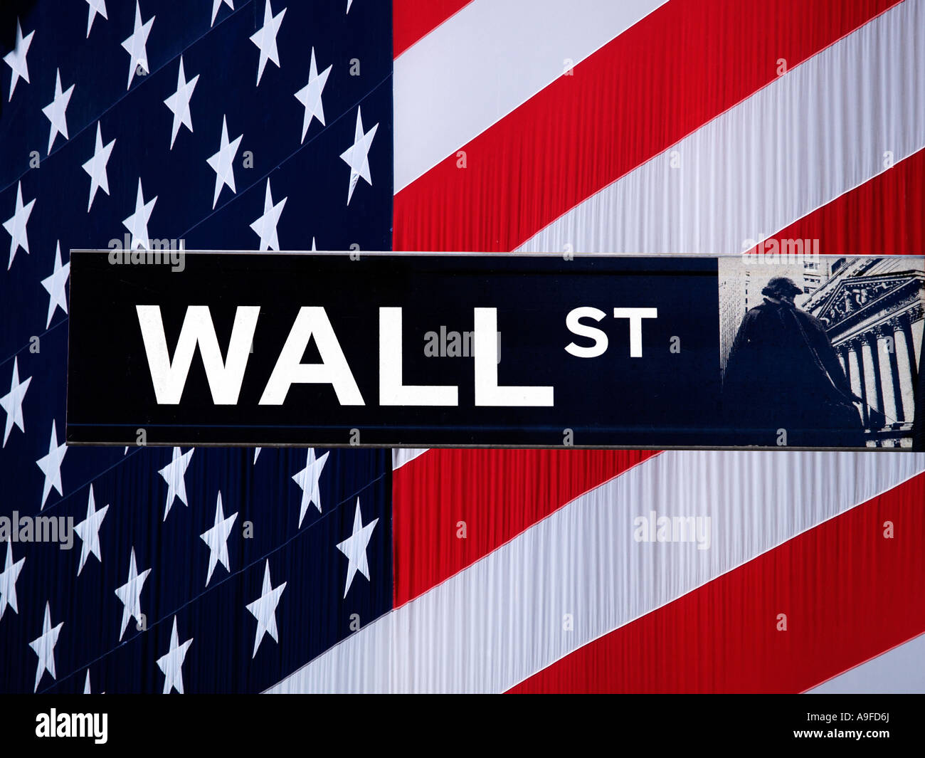 Wall street signpost and American flag Stock Photo - Alamy