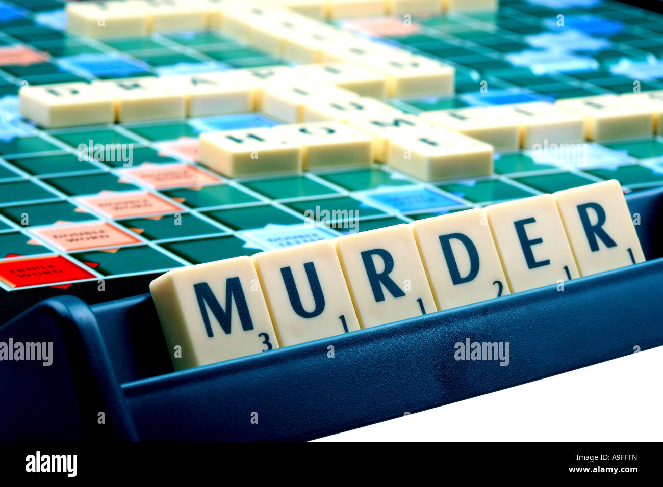 Board game scrabble murder word hi-res stock photography and images - Alamy