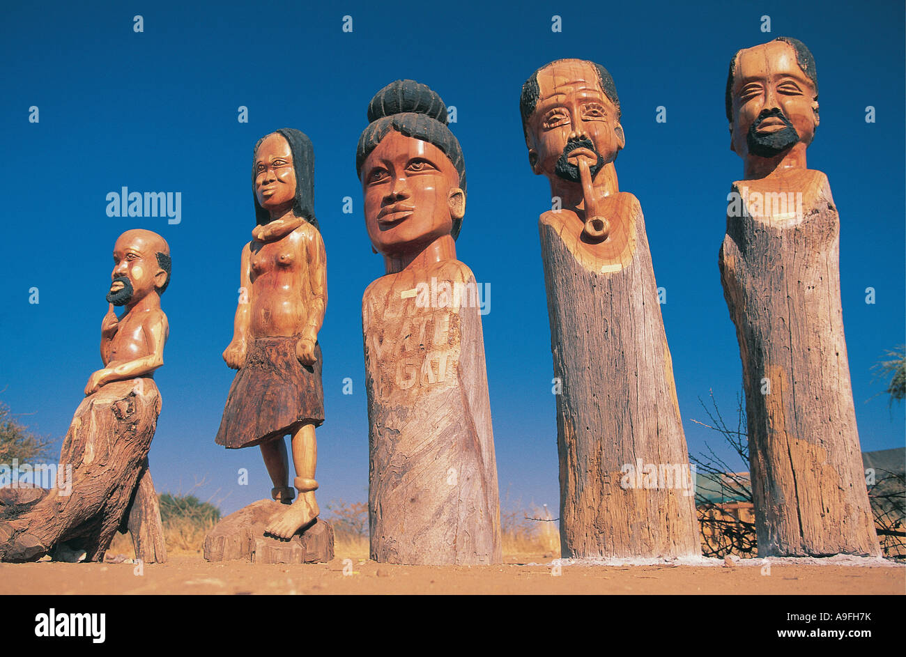 Wooden carvings of human figures in Windhoek Namibia south west Africa ...