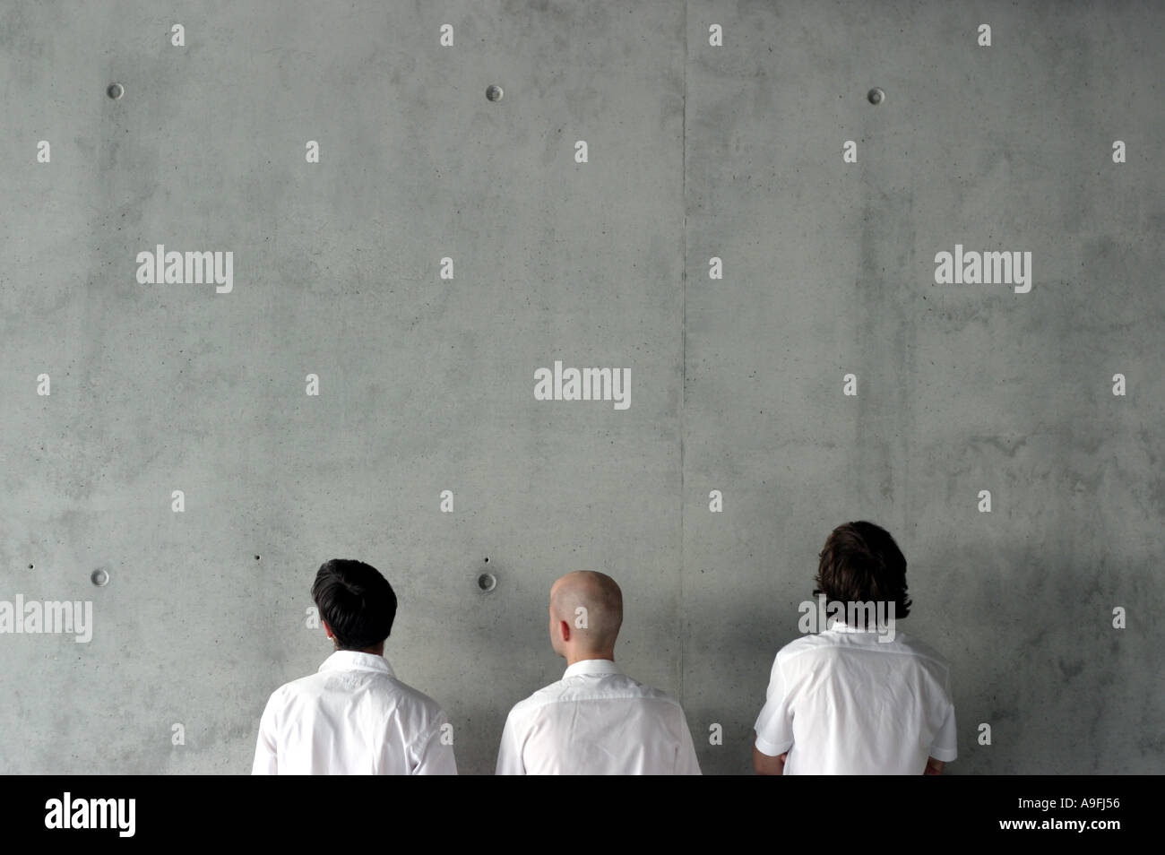 Three guys hi-res stock photography and images - Alamy