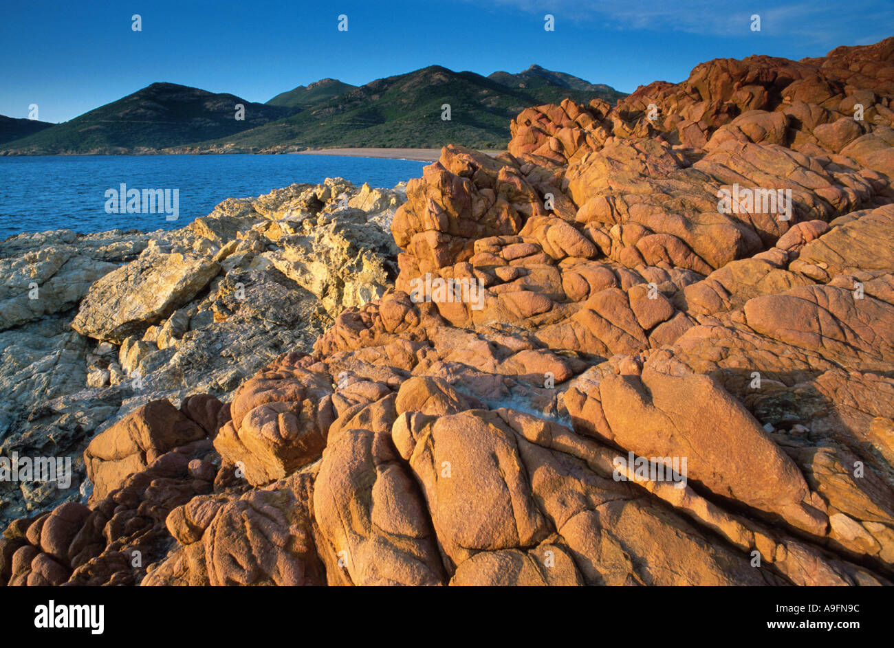 Fango estuary, coloured rock formation, mediterranean sea, France ...