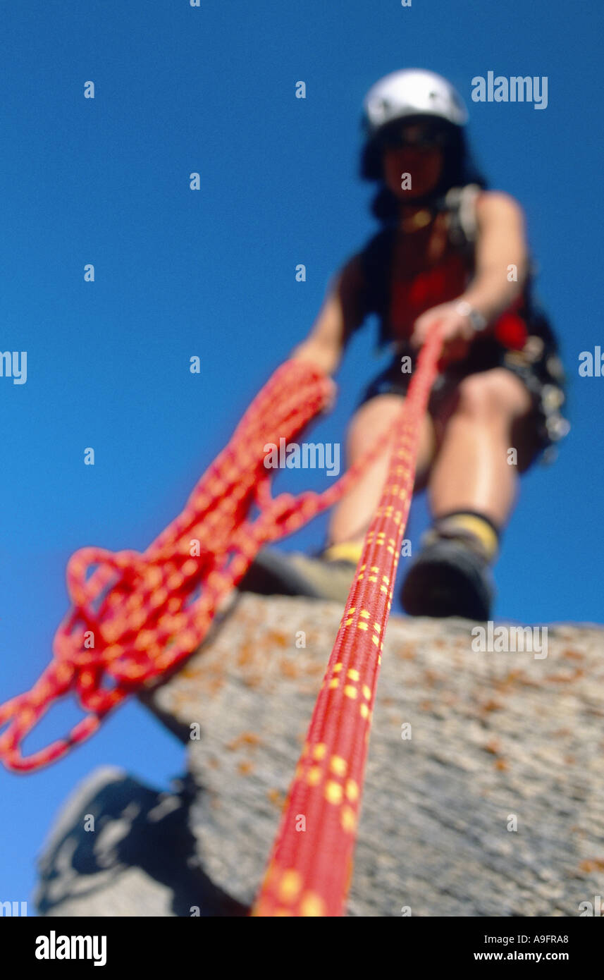 female rock climber with climbing rope Stock Photo - Alamy