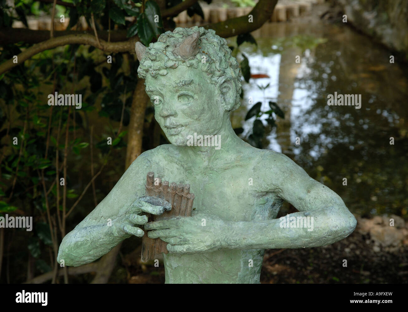 Statue of Pan in the grounds of Pashley Manor in East Sussex Stock ...