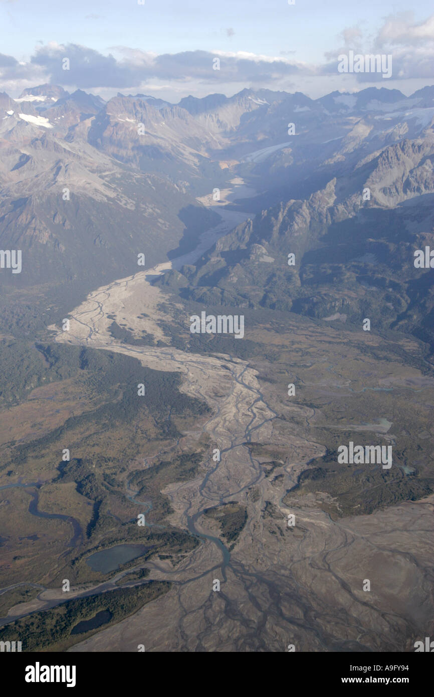 aerial view of braided river channel and alluvial fan flowing into ...