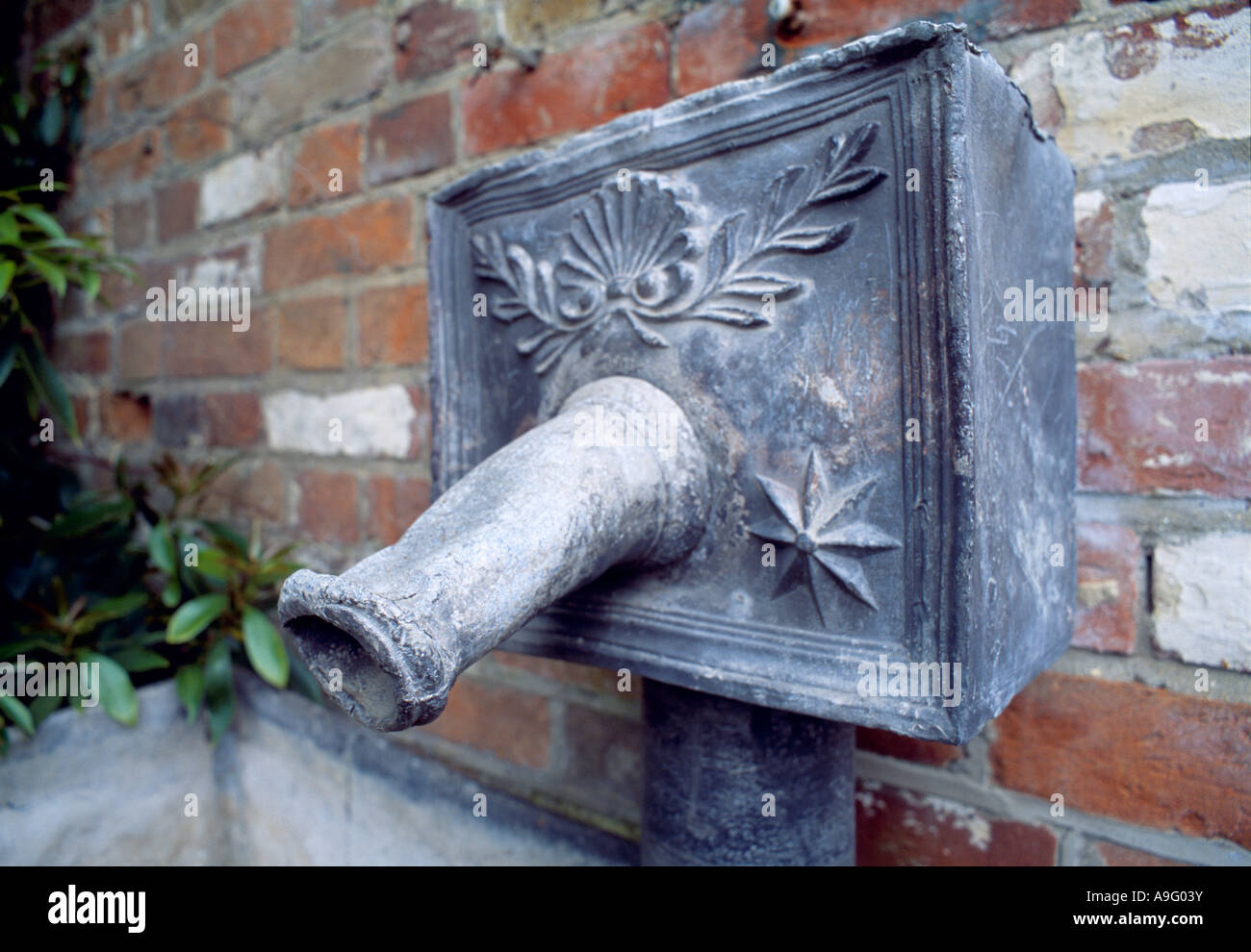 Very old lead water spout Stock Photo - Alamy