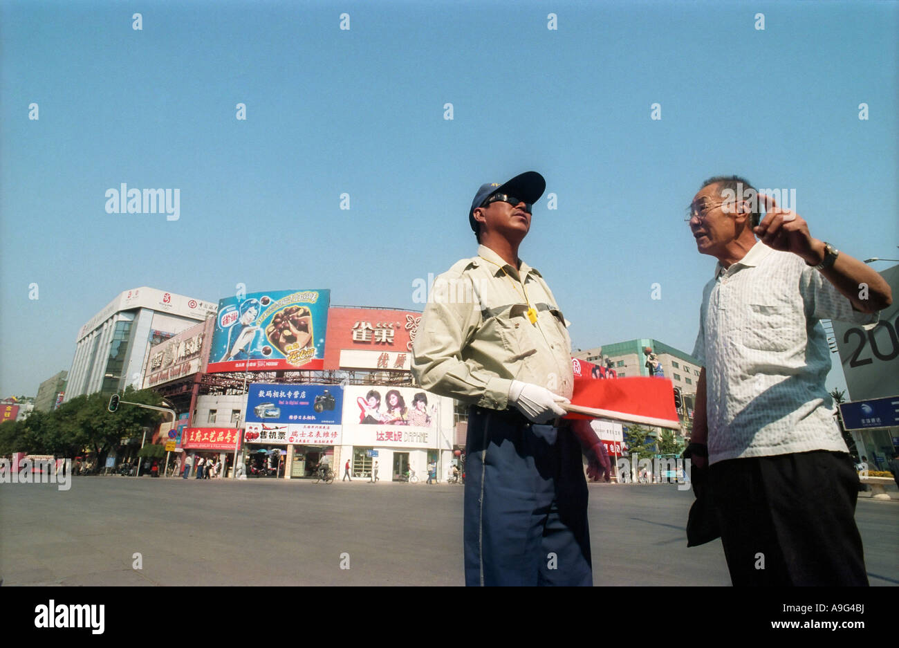 CHN China Beijing Uniformed controlling the traffic at a crossing ...