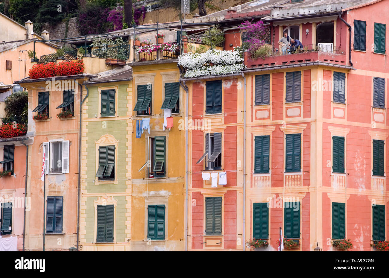 Painted buildings and washing Portofino Italy Stock Photo - Alamy