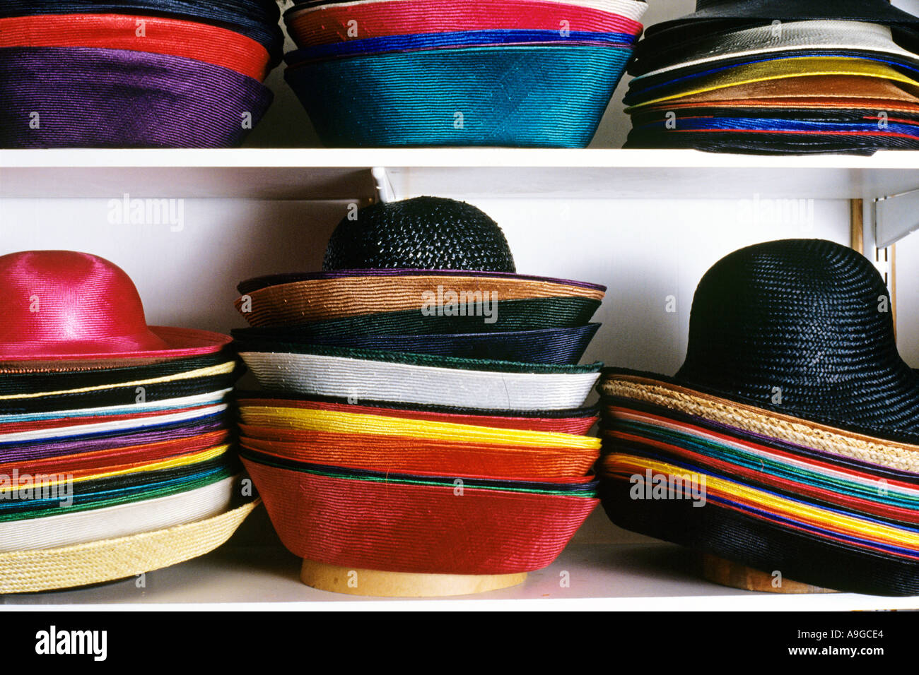 Coloured straw hats hi-res stock photography and images - Alamy