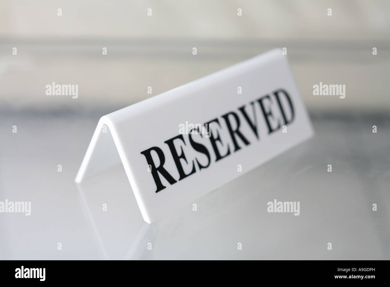 reserved sign on a bar table Stock Photo - Alamy