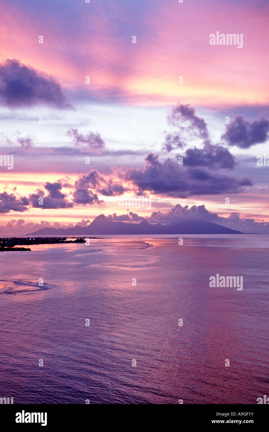 Sunset over the island of Moorea as seen from Tahiti in the Society ...