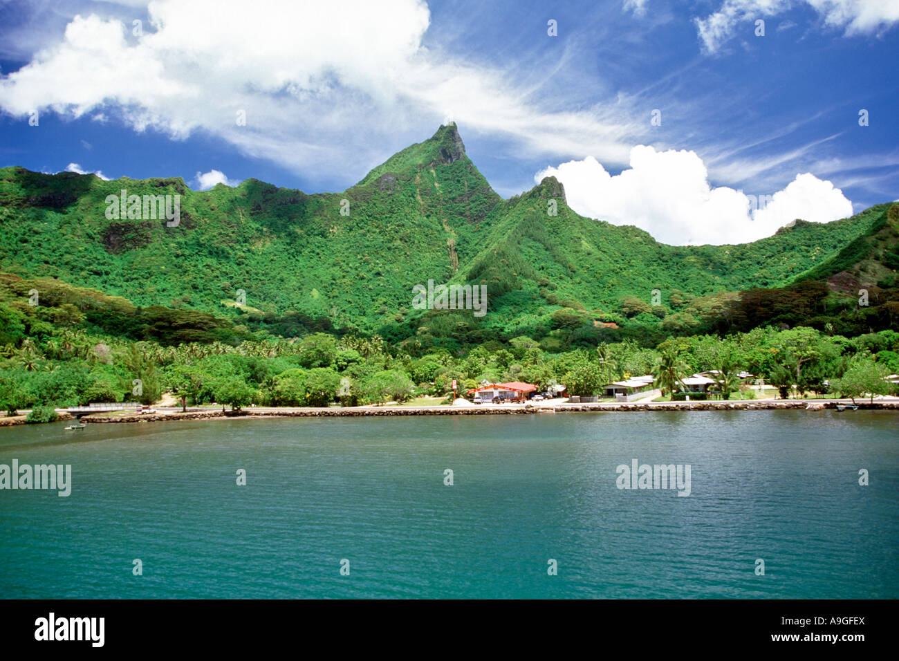 View of Vaiareare ferry port and the island of Moorea near Tahiti in ...