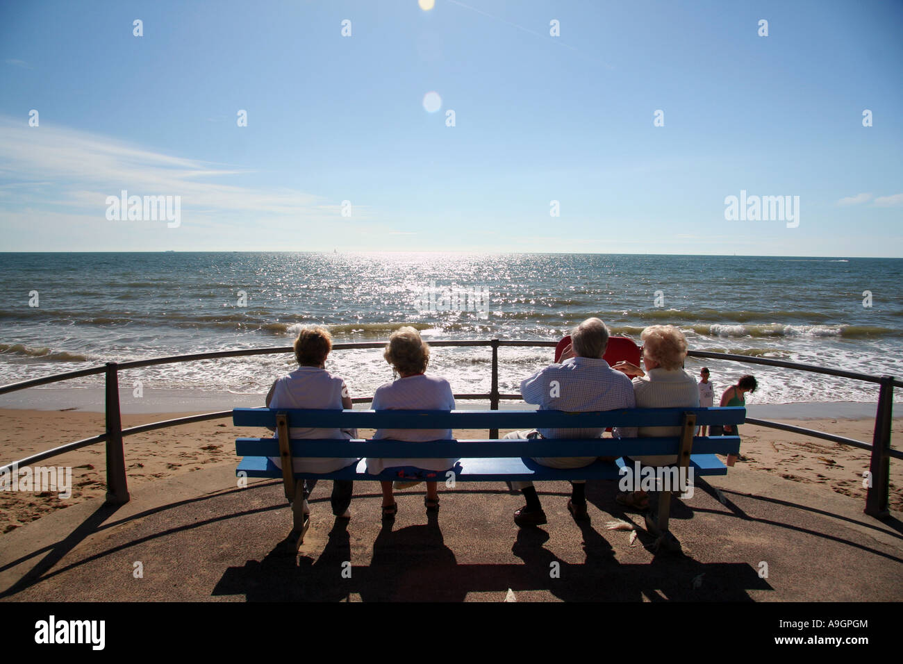 People enjoy the sun on the beach at bournemouth hi-res stock ...