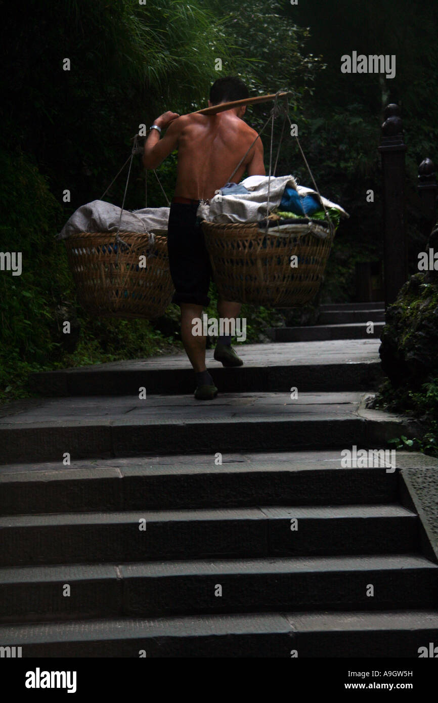 Muscled Chinese Yoke Carrier Stock Photo - Alamy