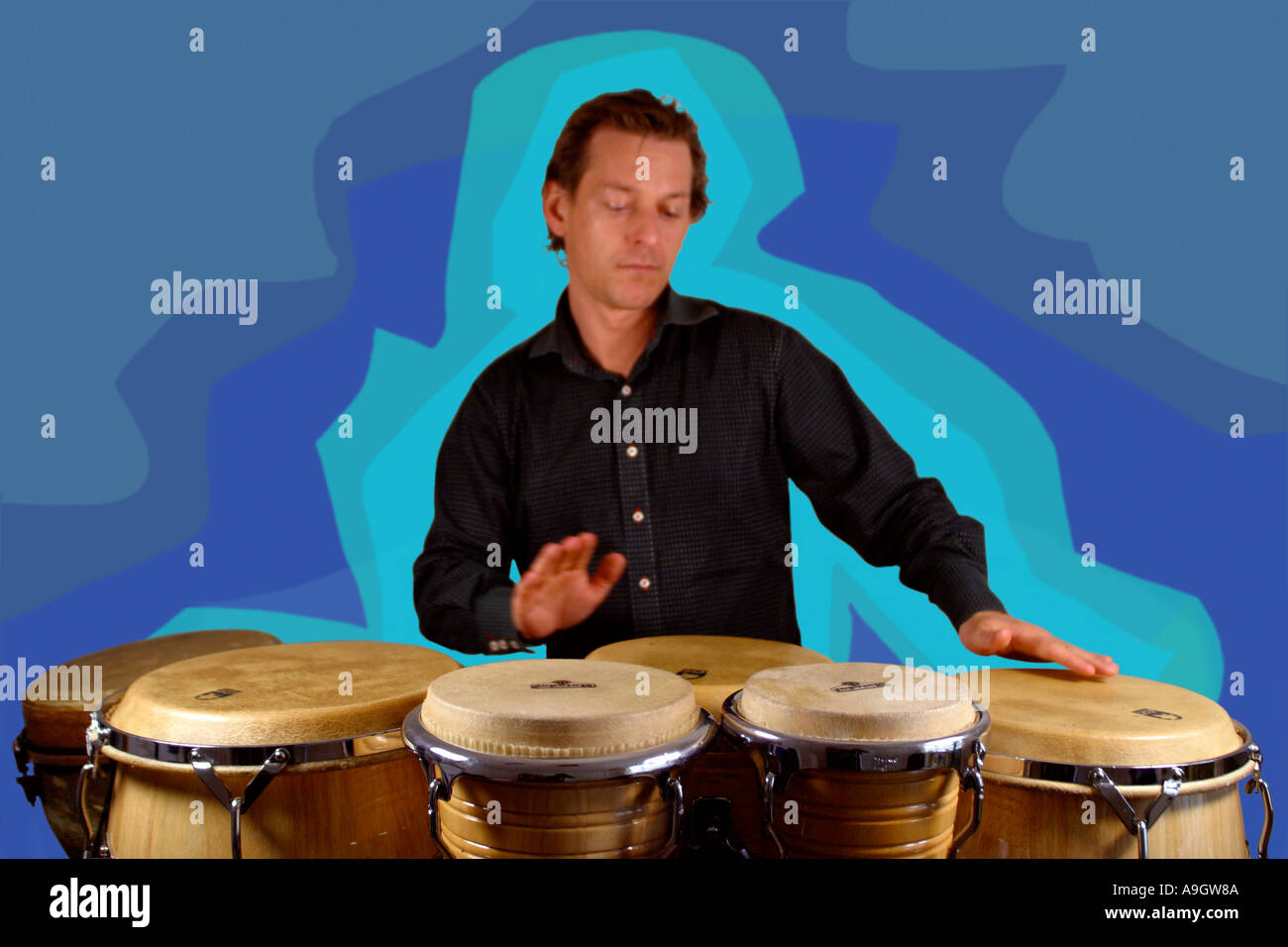 Playing congo drums hi-res stock photography and images - Alamy