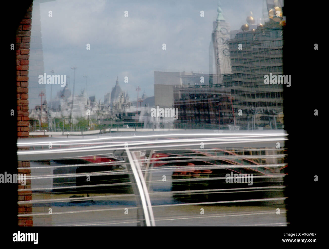 warped view of the millennium bridge and river thames reflected in the ...