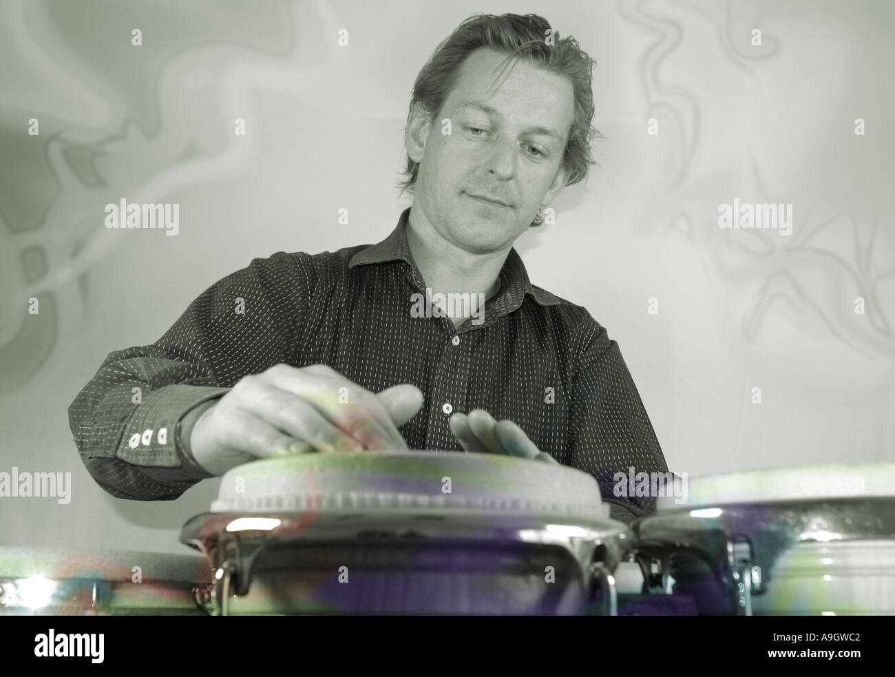 Playing congo drums hi-res stock photography and images - Alamy