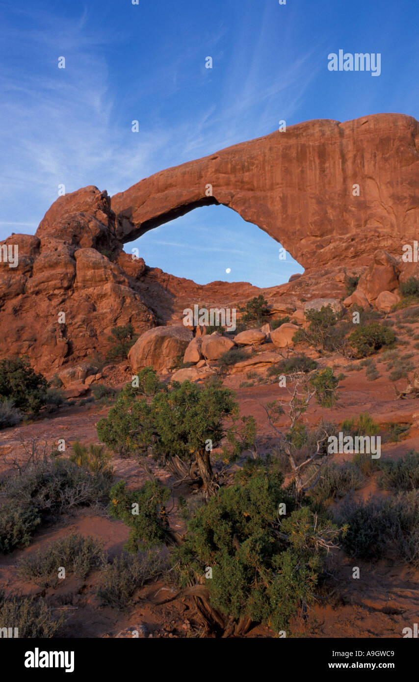 Moon seen through rock formation hi-res stock photography and images ...