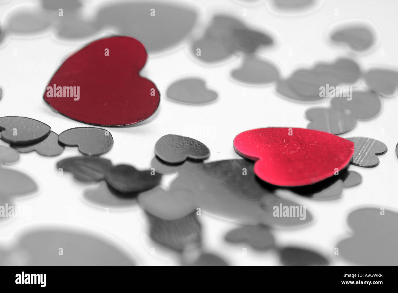 Lots of different sized Hearts in colour and mono Stock Photo - Alamy