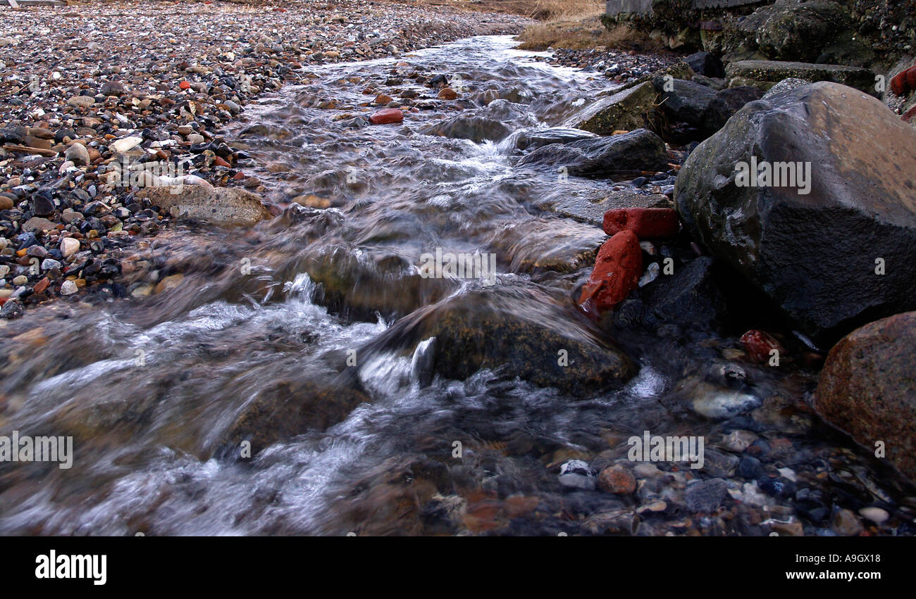 Detail water running in small hi-res stock photography and images - Alamy