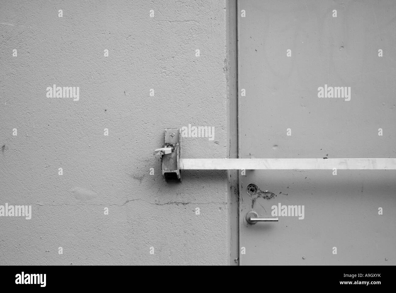 A door with a big lock Stock Photo - Alamy