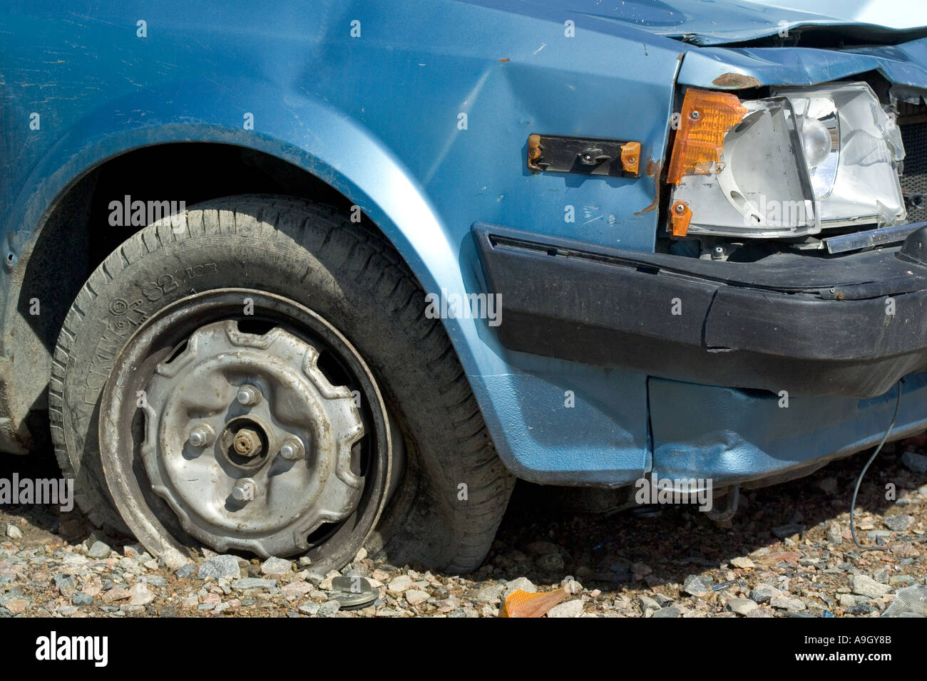 Car with destroyed tire hi-res stock photography and images - Alamy