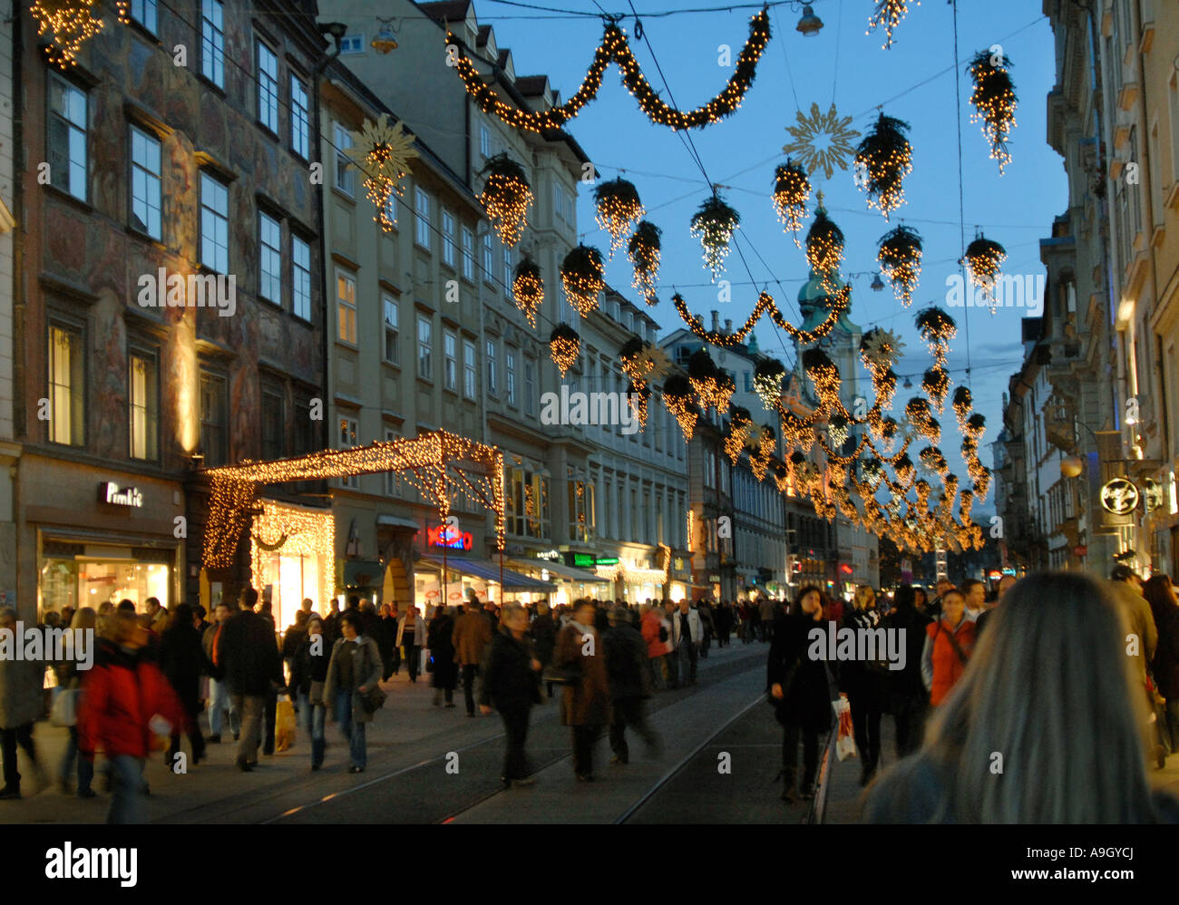 Pedestrians on a major shopping thoroughfare in Graz just before ...