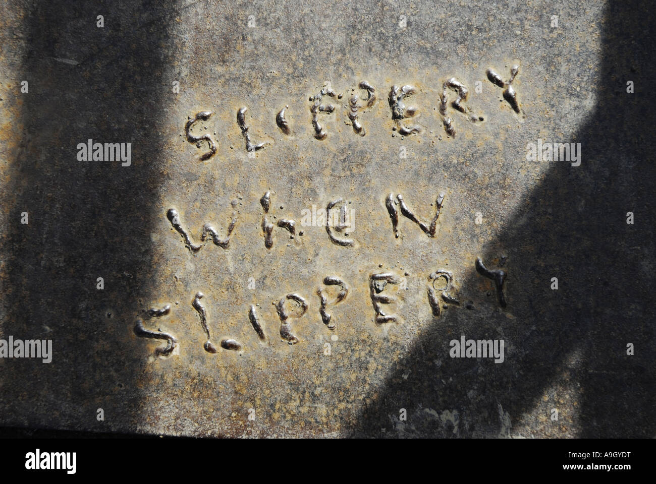 Warning sign of slippery ground hi-res stock photography and images - Alamy