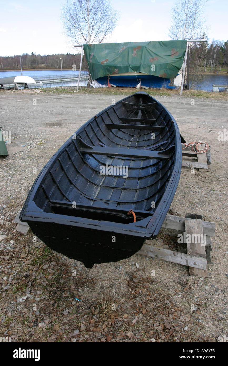 tar covered boat Stock Photo - Alamy