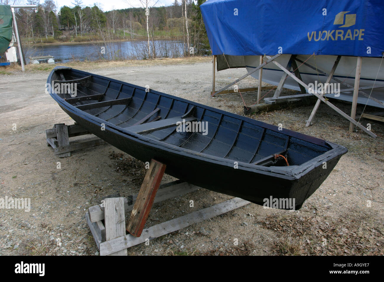 tar covered boat Stock Photo - Alamy