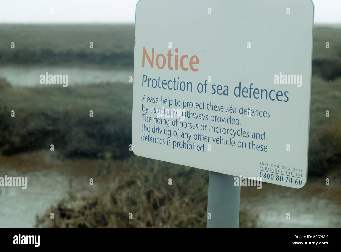 Notice advising people to help protect sea defences, Norfolk, England ...