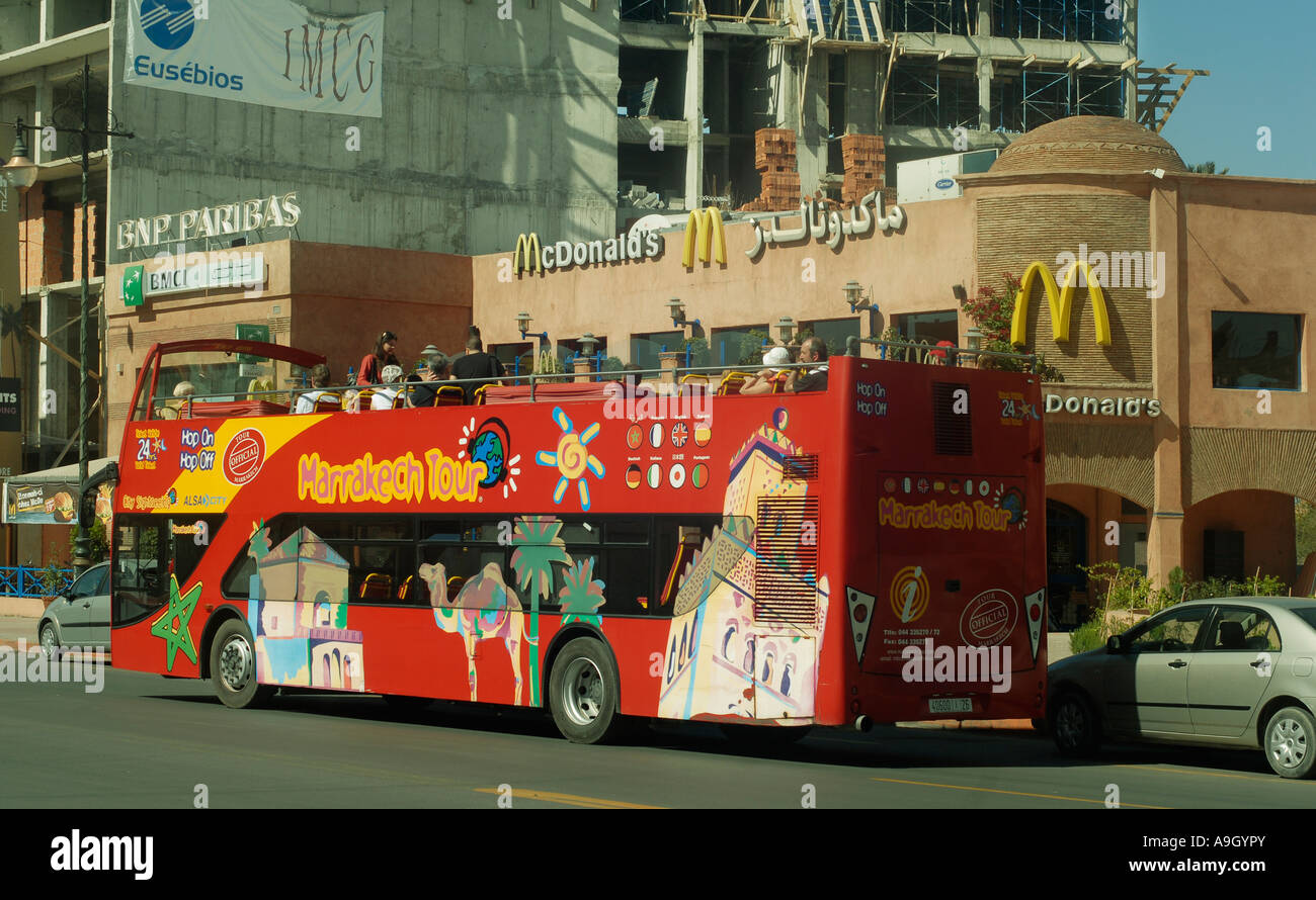 The Marrakech tour bus outside a fast food restaurant Stock Photo - Alamy