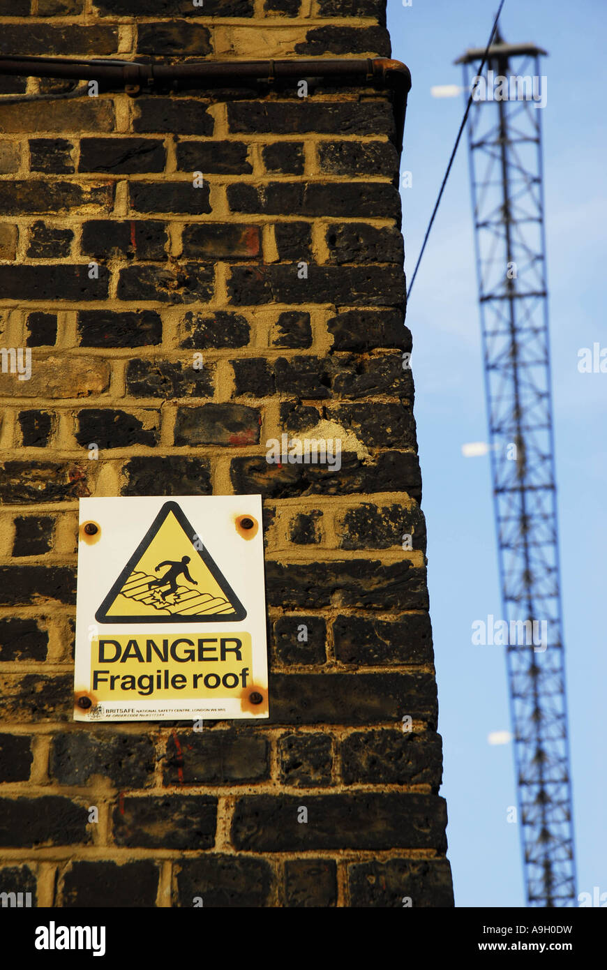 Sign stating 'DANGER - Fragile roof' Stock Photo - Alamy