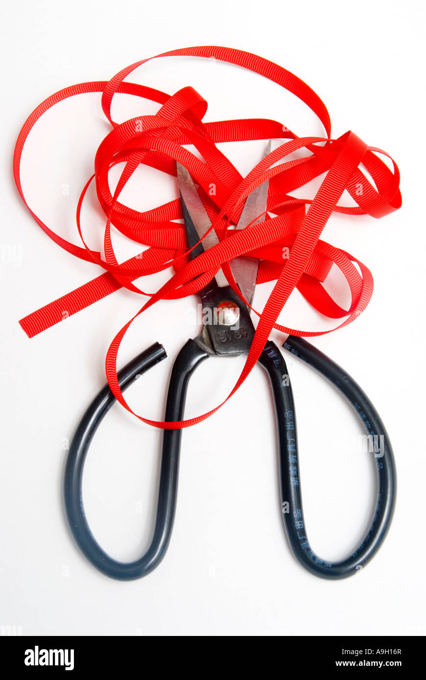 Slashing red tape hi-res stock photography and images - Alamy