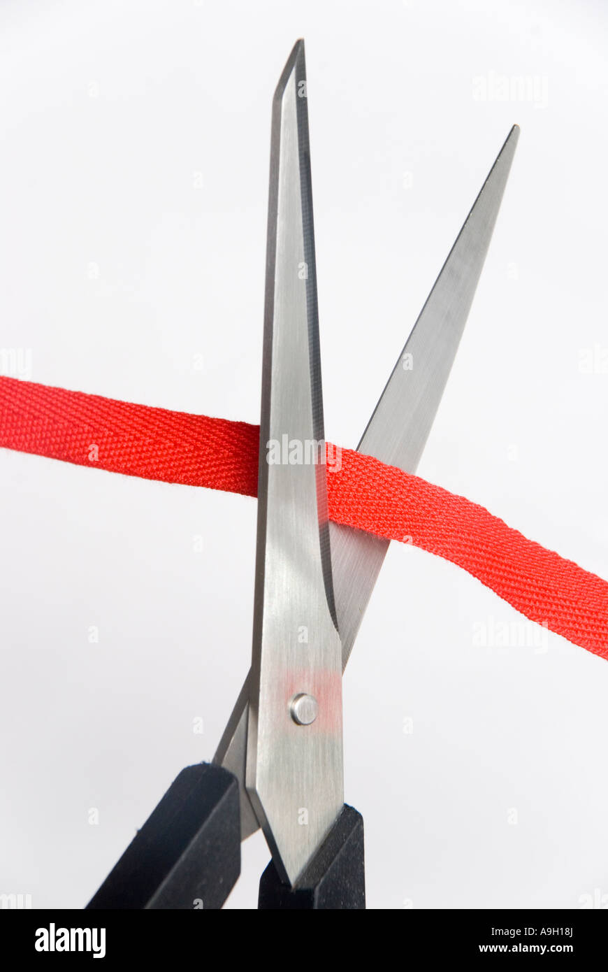 Slashing red tape hi-res stock photography and images - Alamy