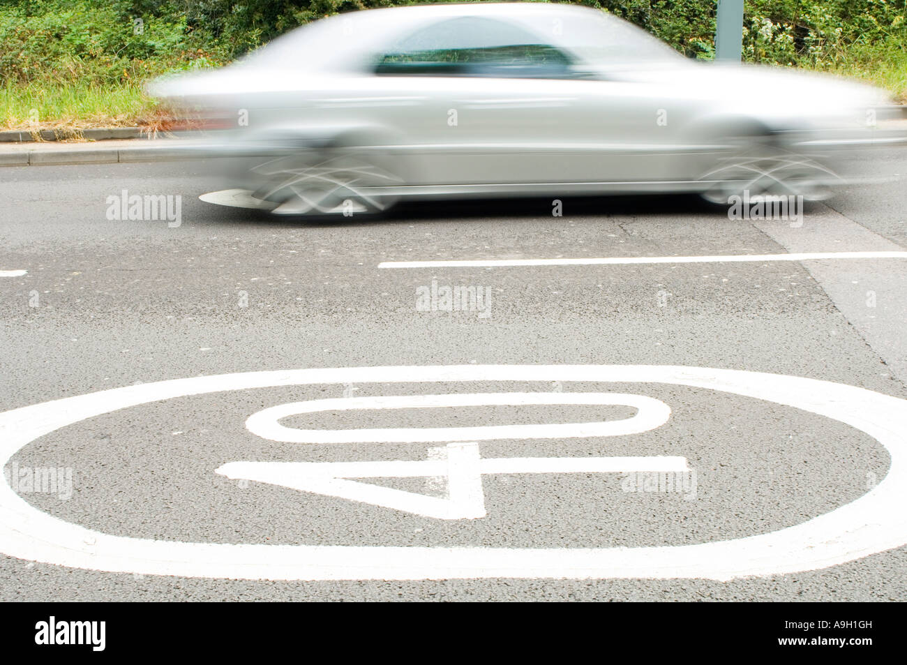 Car speeding street england hi-res stock photography and images - Alamy