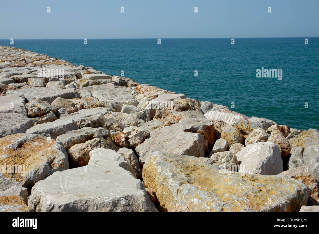 Manmade stone pier Stock Photo - Alamy
