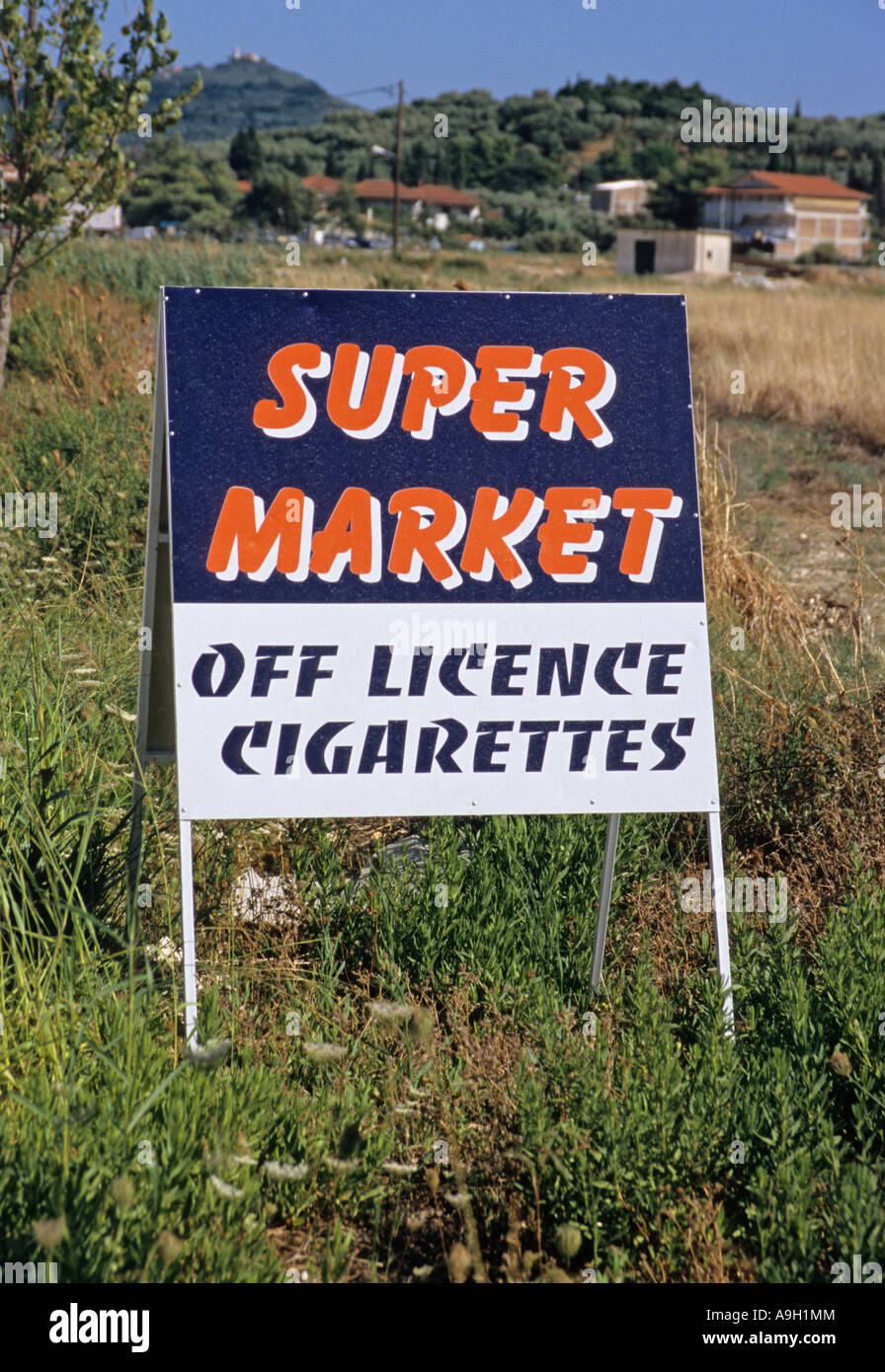 supermarket sign board on the ground Stock Photo - Alamy
