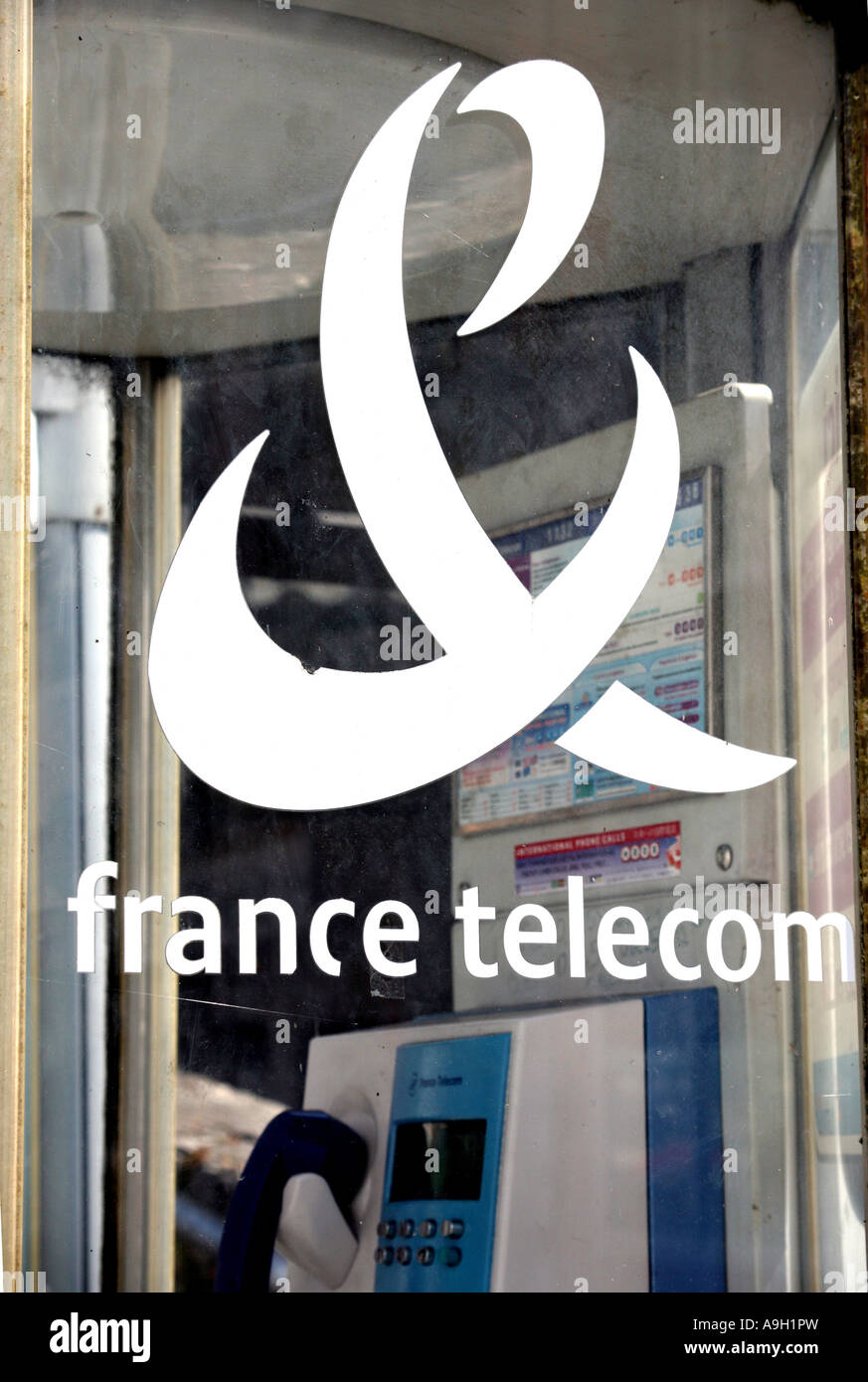 Logo of France Telecom communications company on public telephone box ...