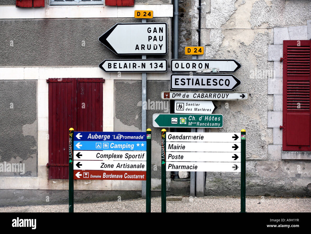 Proliferation of direction signs in small French town 2007 Stock Photo ...
