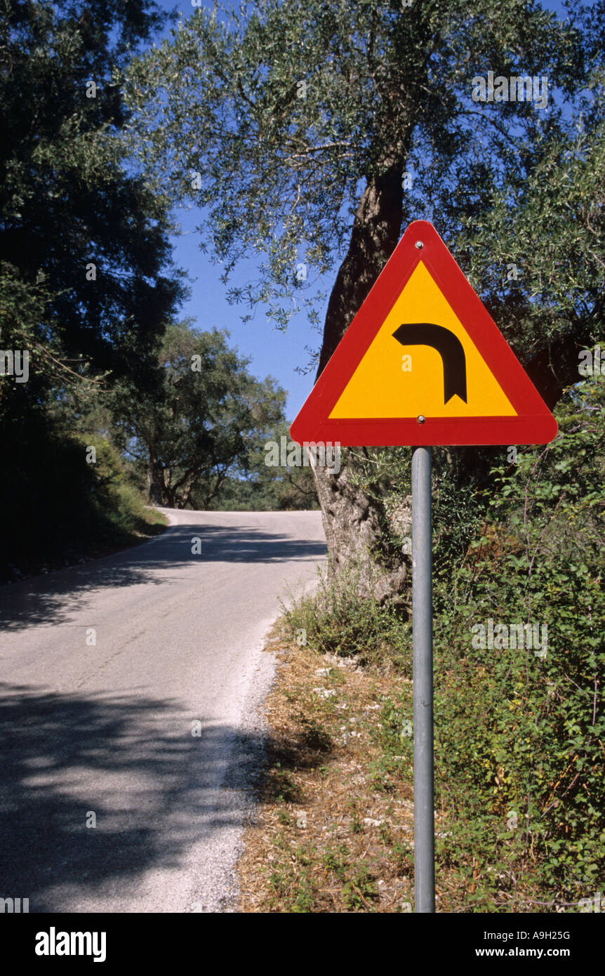 left turn roadsign in a country road Stock Photo - Alamy
