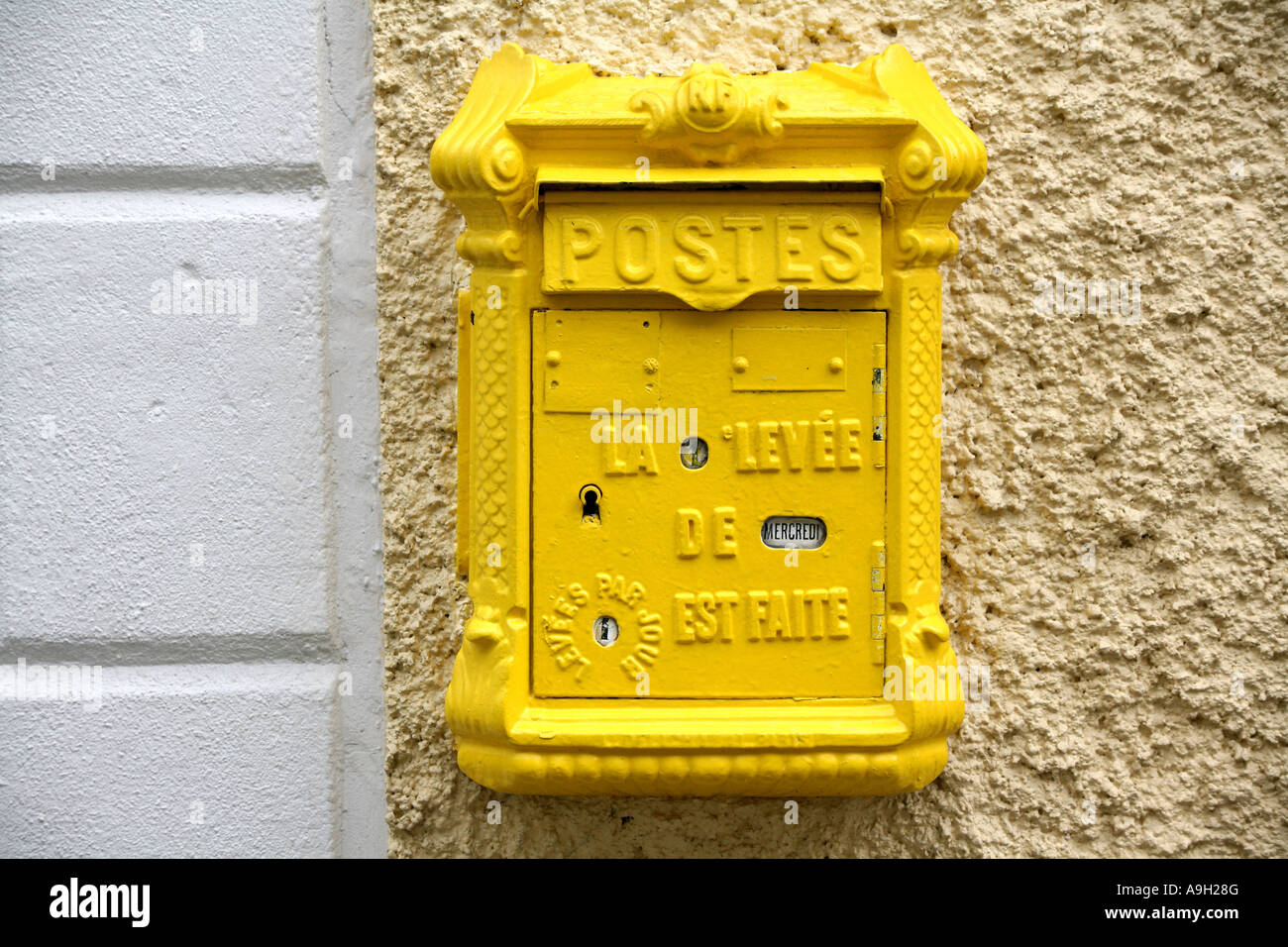 Old style post box on wall in small French town 2007 Stock Photo - Alamy
