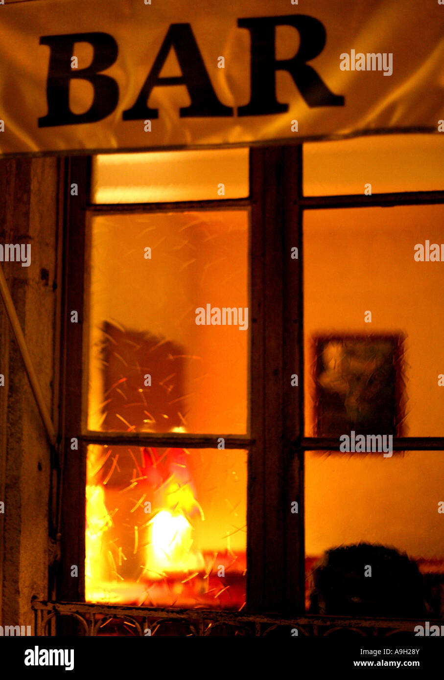 Window of bar at night in French town of Pau 2007 Stock Photo - Alamy