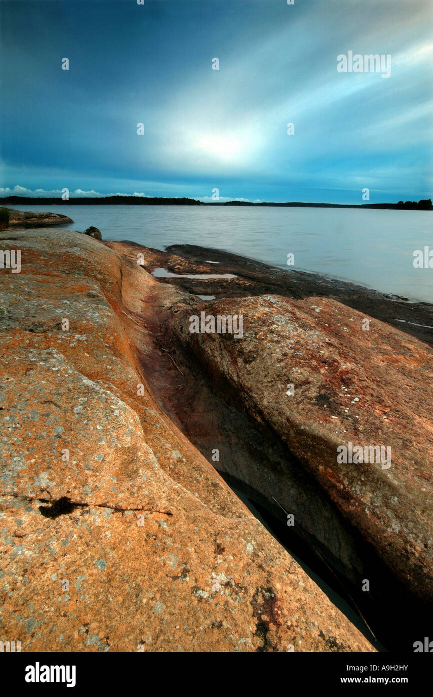 Rock formations at the small islands Lefseholmene in the lake Vansjø ...